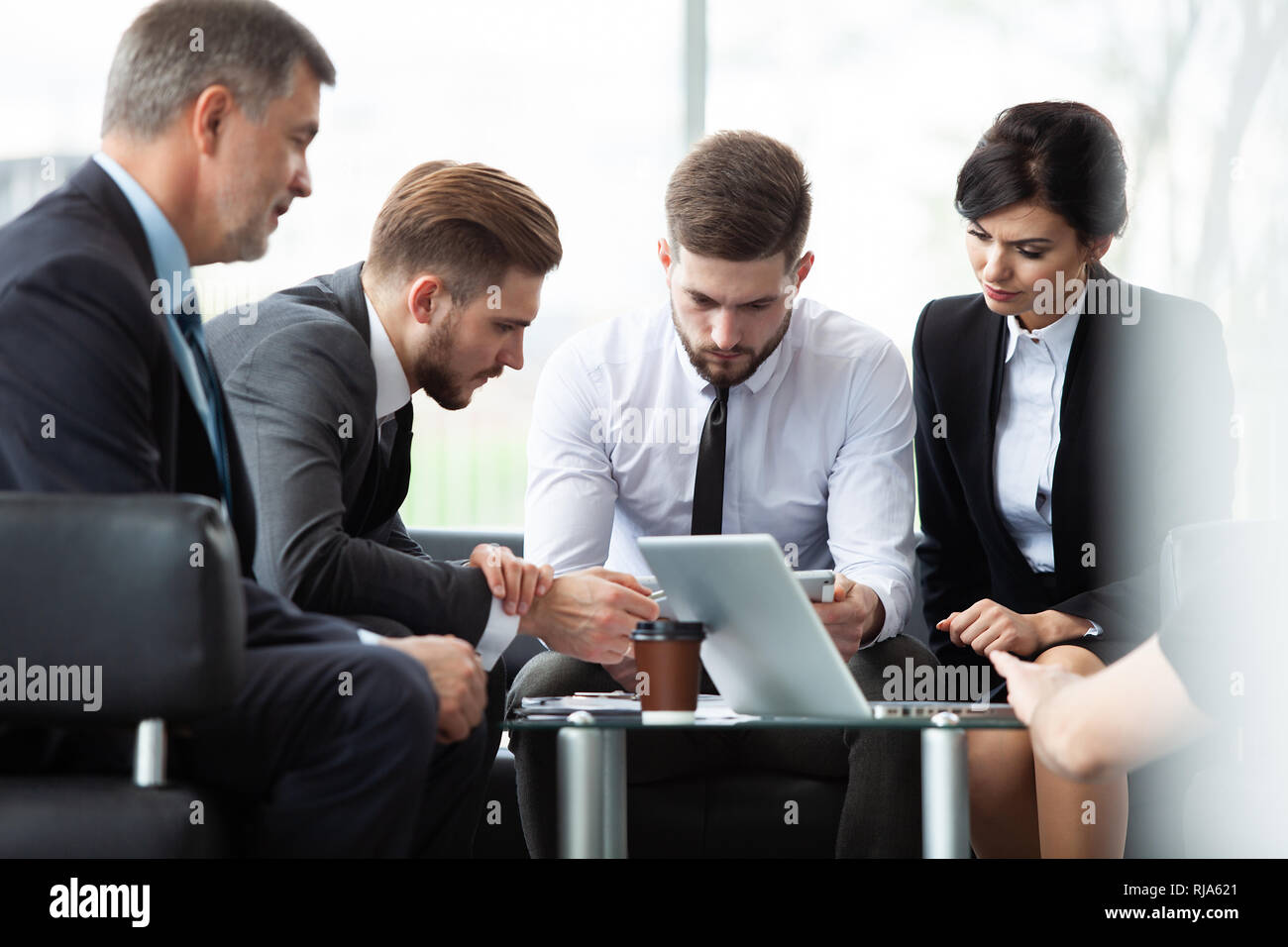 Corporate business team meeting in a modern open plan office Stock ...