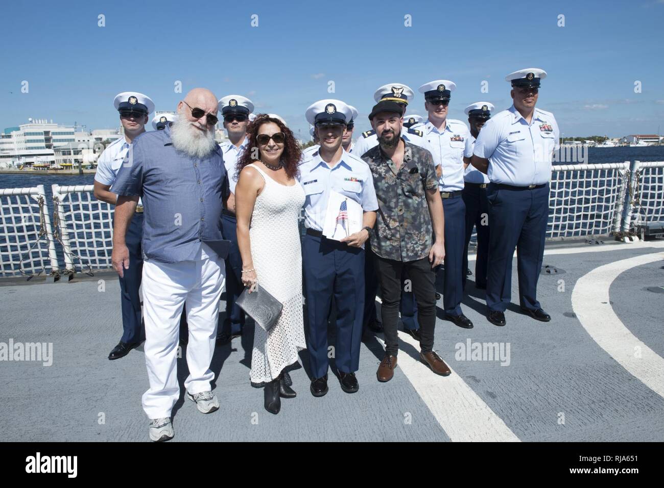 Coast Guard Cutter Resolute crew member Seaman Samuel Gonzalez stands ...