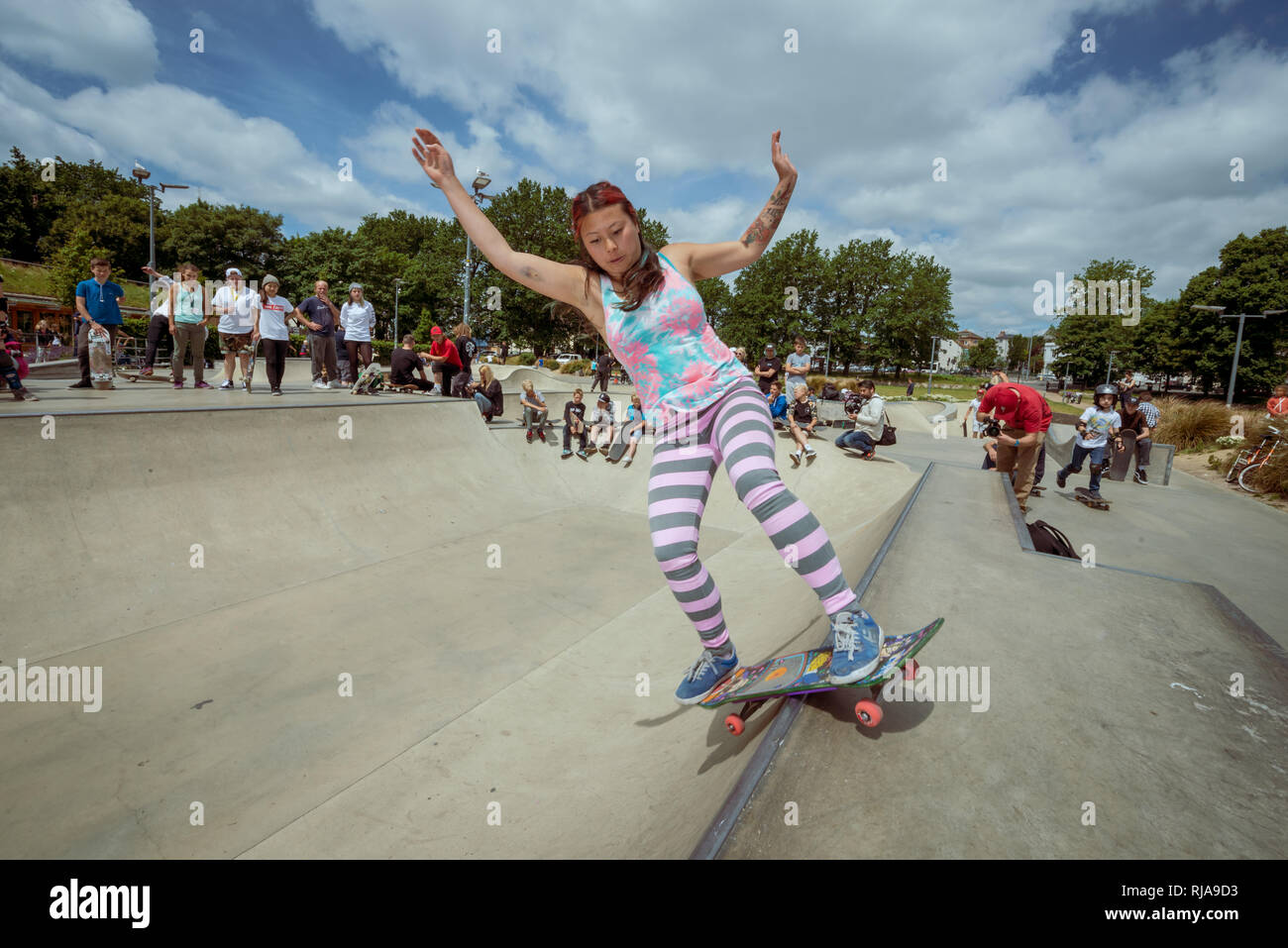 A teenage girl skating at The Level Skatepark in Brighton, East Sussex ...