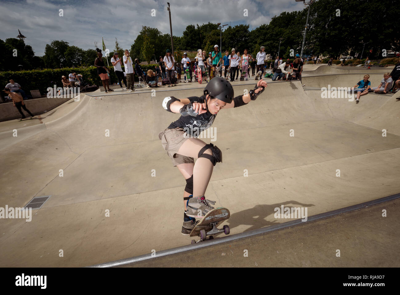 A teenage girl skating at The Level Skatepark in Brighton, East Sussex ...