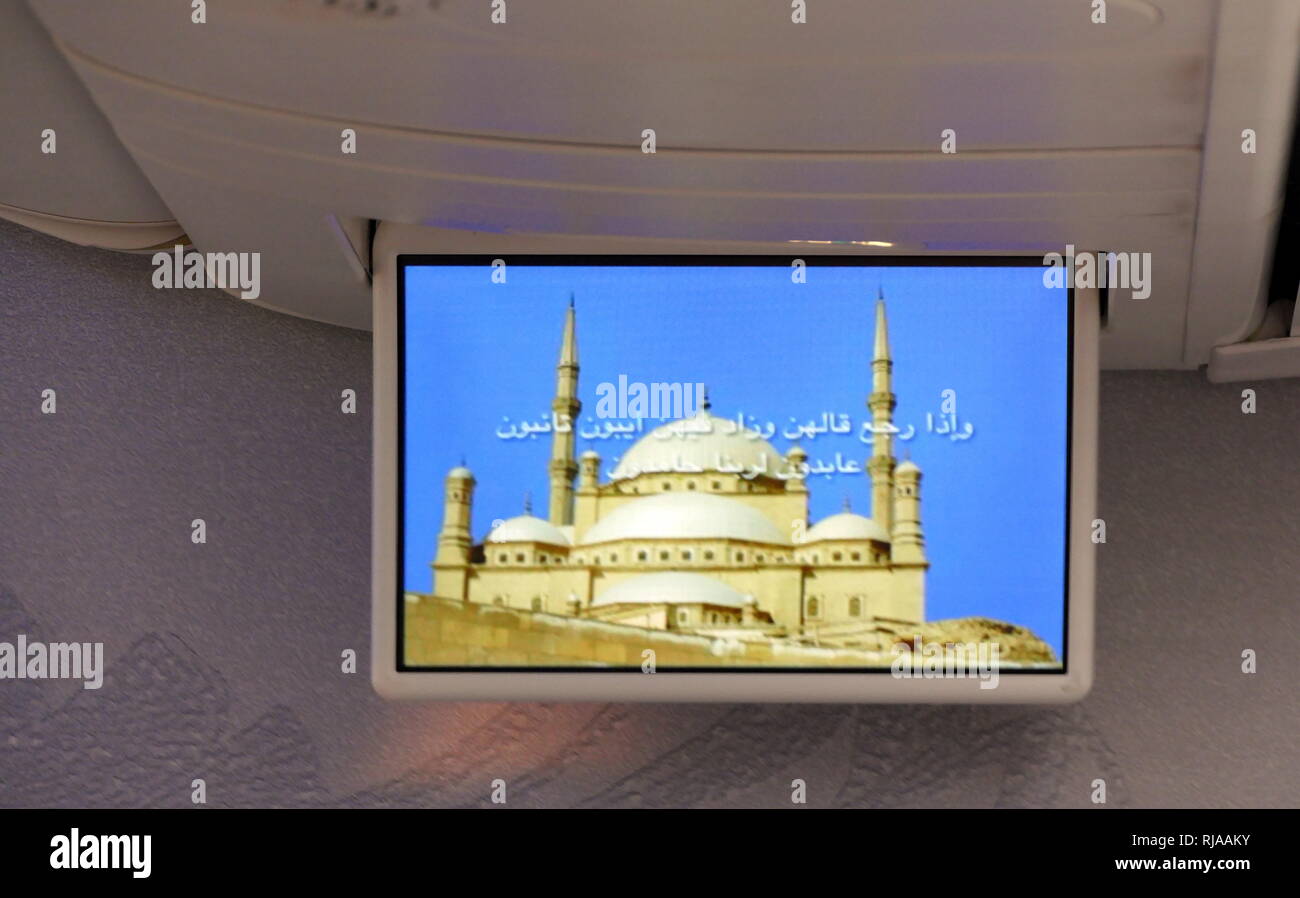 Retractable screen with in-flight display of a prayer from an Egypt Air ...