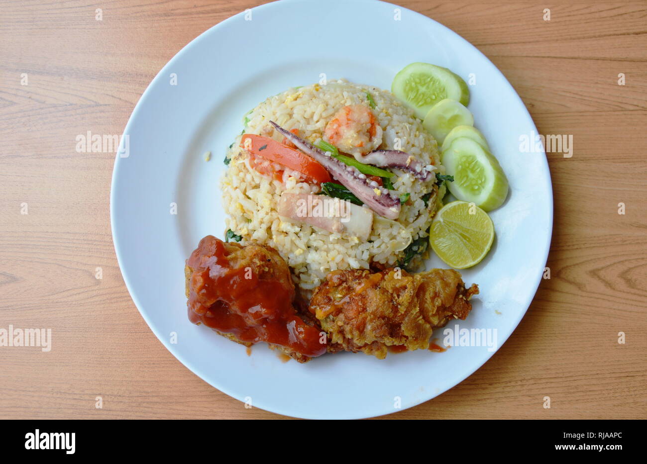 Plate Of Fried Rice And Chicken