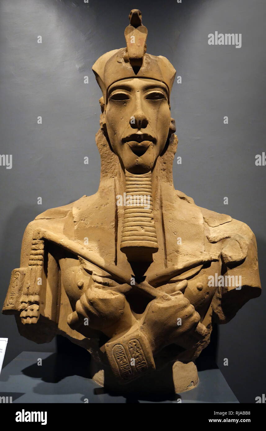 King Amenhotep IV with the Double Crown of Upper and Lower Egypt. Amarna style sculpture circa ...