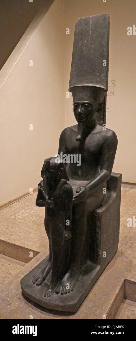 Detail of a statue of Amun with Horemheb before him. 18th Dynasty ...