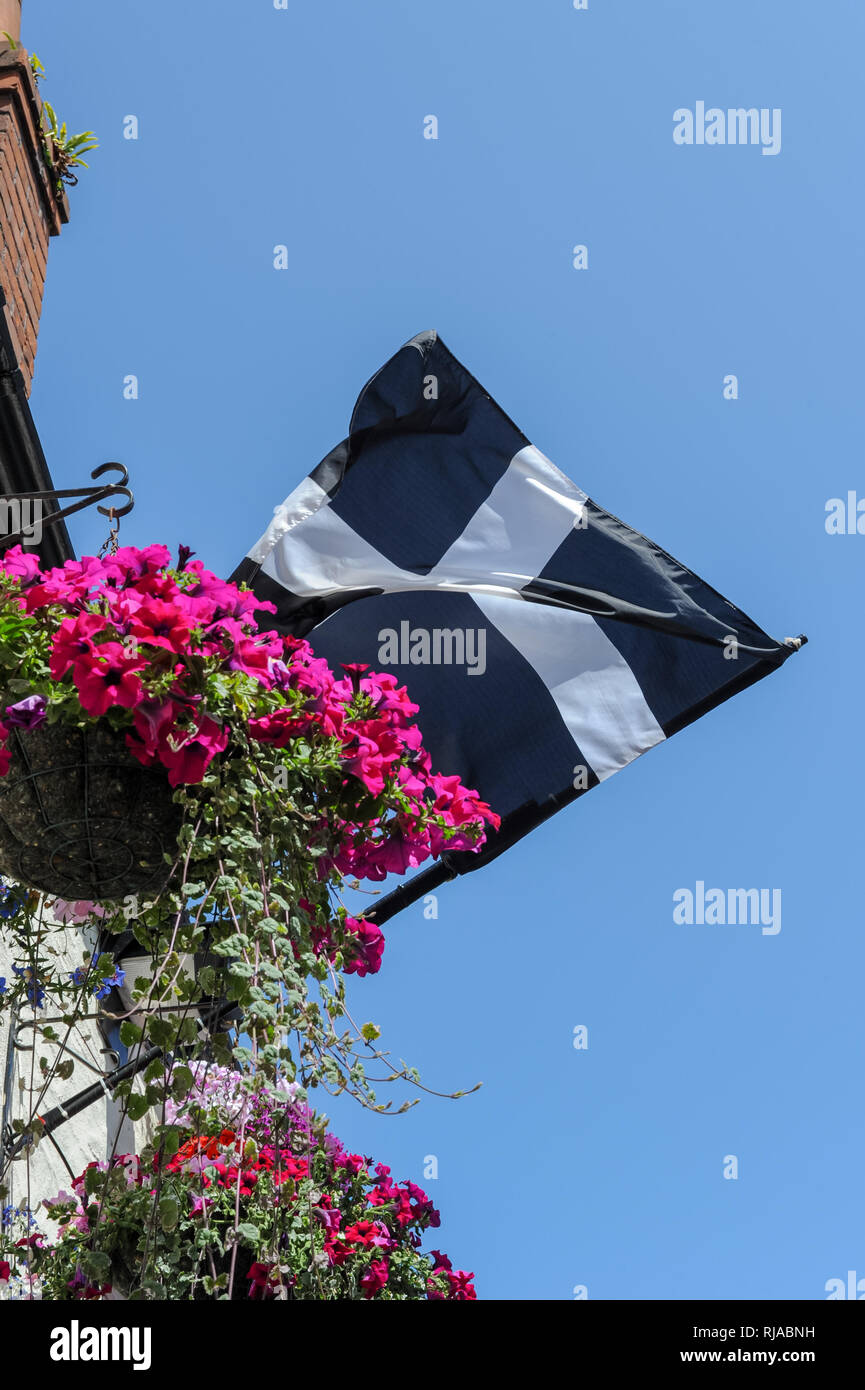 Saint Piran's Flag, the flag of Cornwall, flying outside a pub in ...
