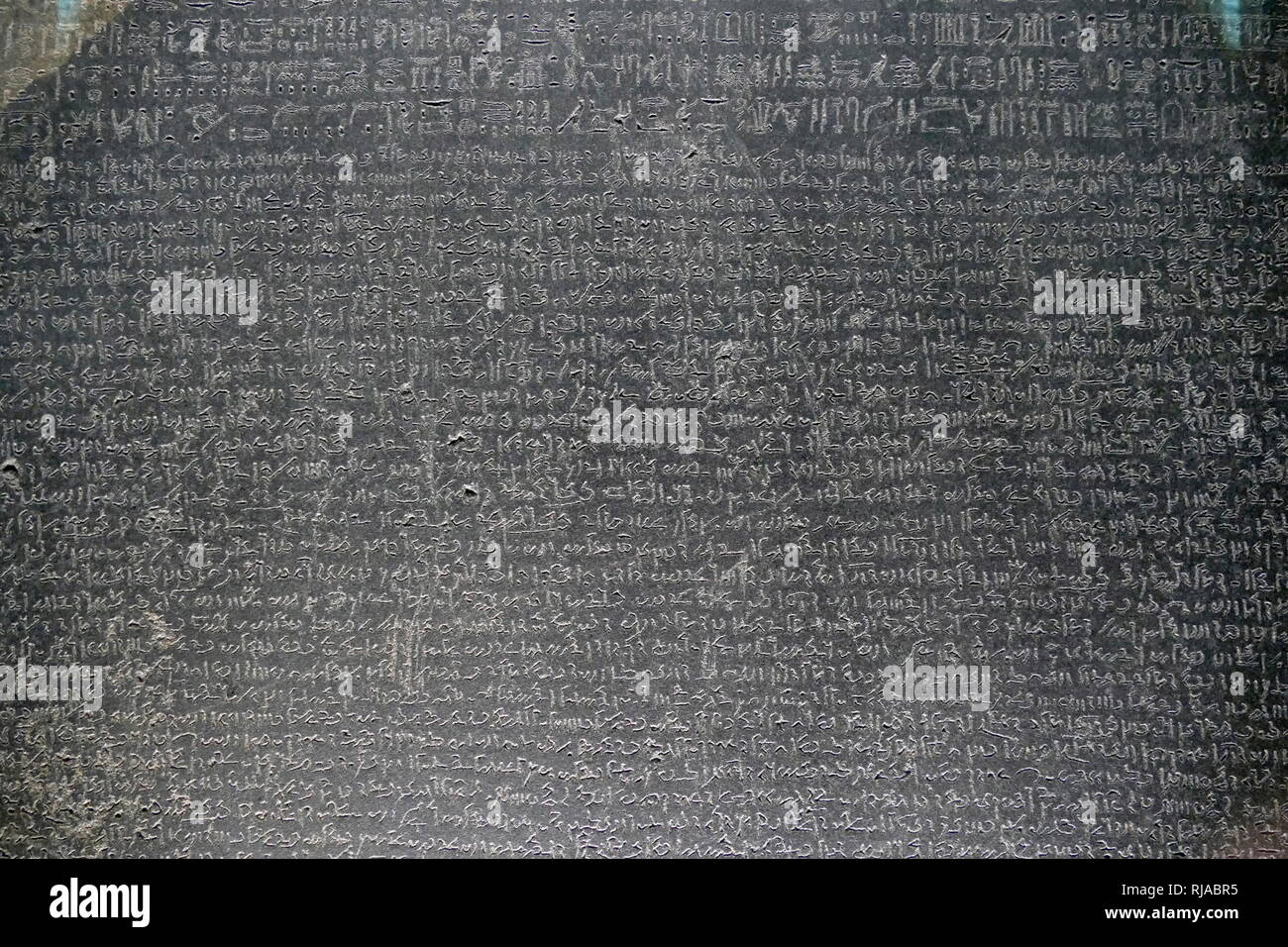 Detail from the Rosetta stone showing hieroglyphic and Demotic texts ...