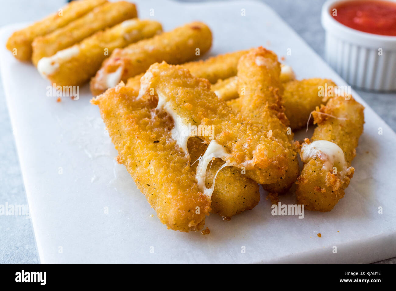 Breaded Fried Mozzarella Cheese Sticks with Ketchup Dipping Sauce ...