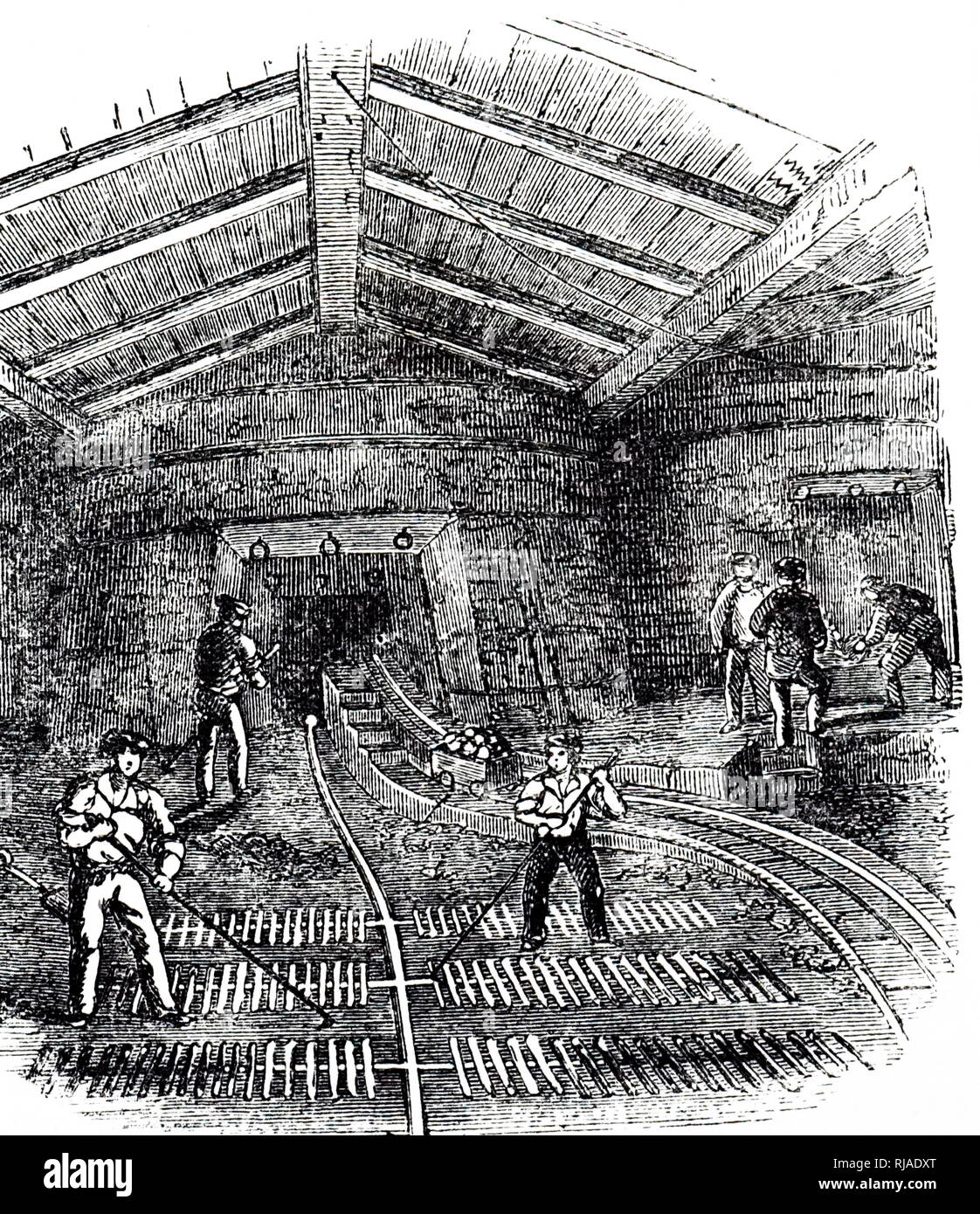 An engraving depicting the casting of iron into ingots or 'pigs'. Dated ...
