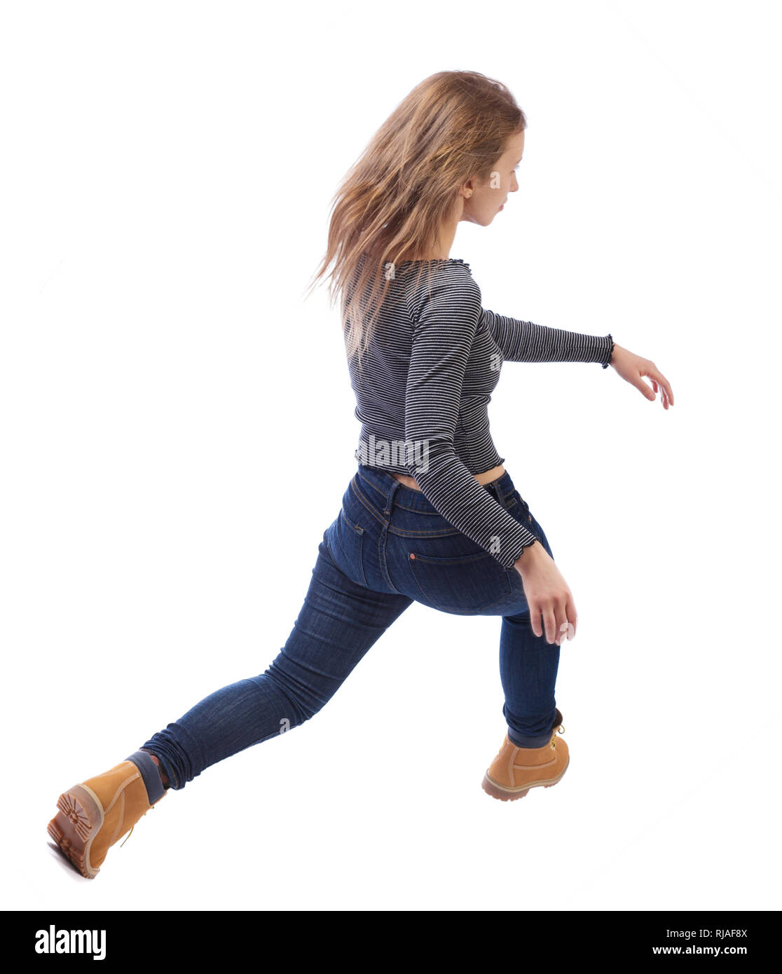 Balancing young woman. or dodge falling woman. Rear view people ...