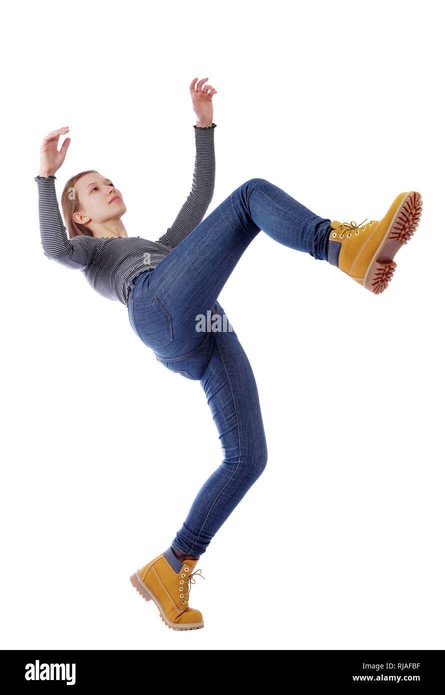 Balancing young woman. or dodge falling woman. Rear view people ...