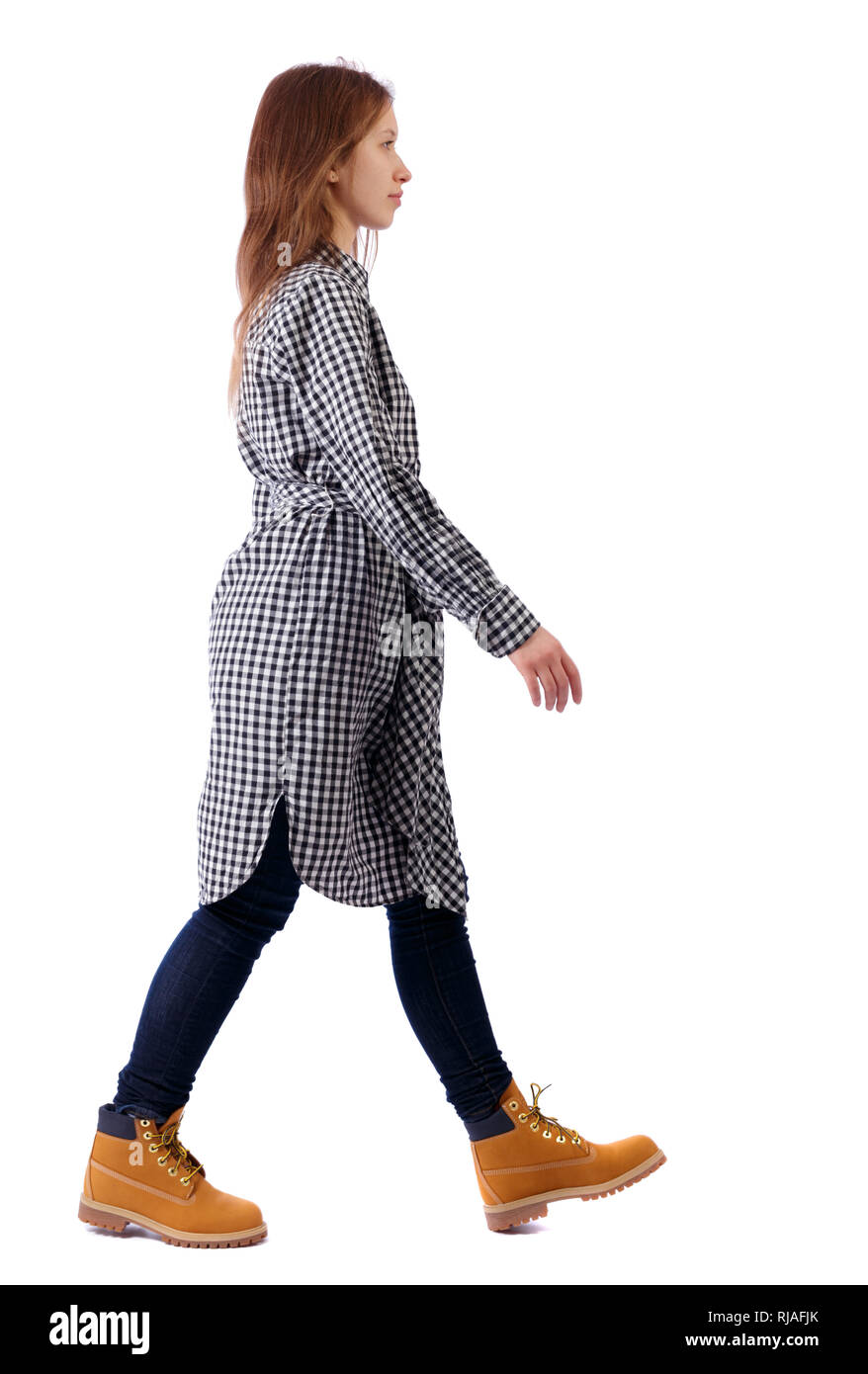 side view of walking woman. beautiful girl in motion. backside view of ...