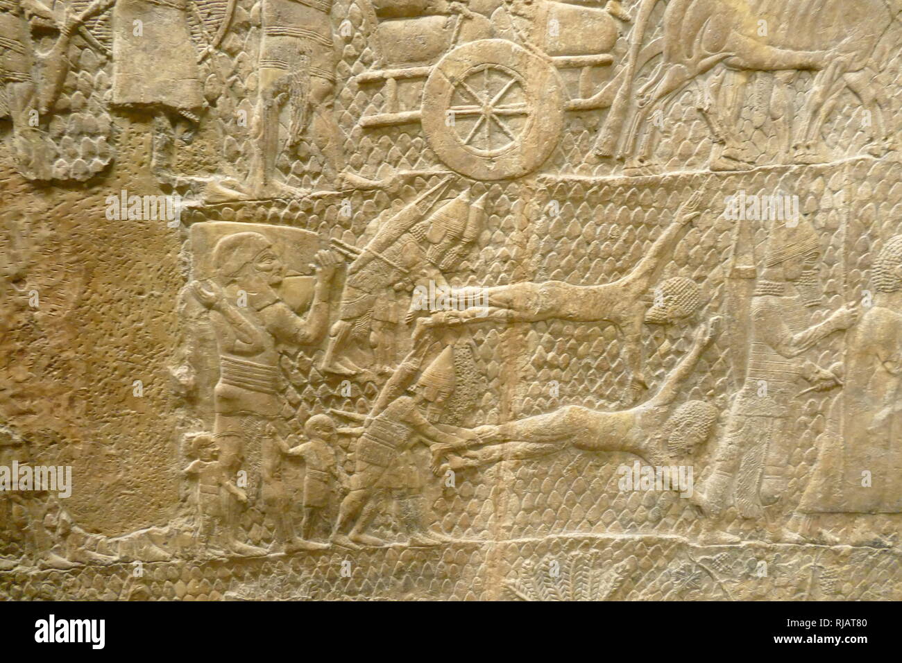 Stone carved relief depicting an prisoners captured after the attack on ...