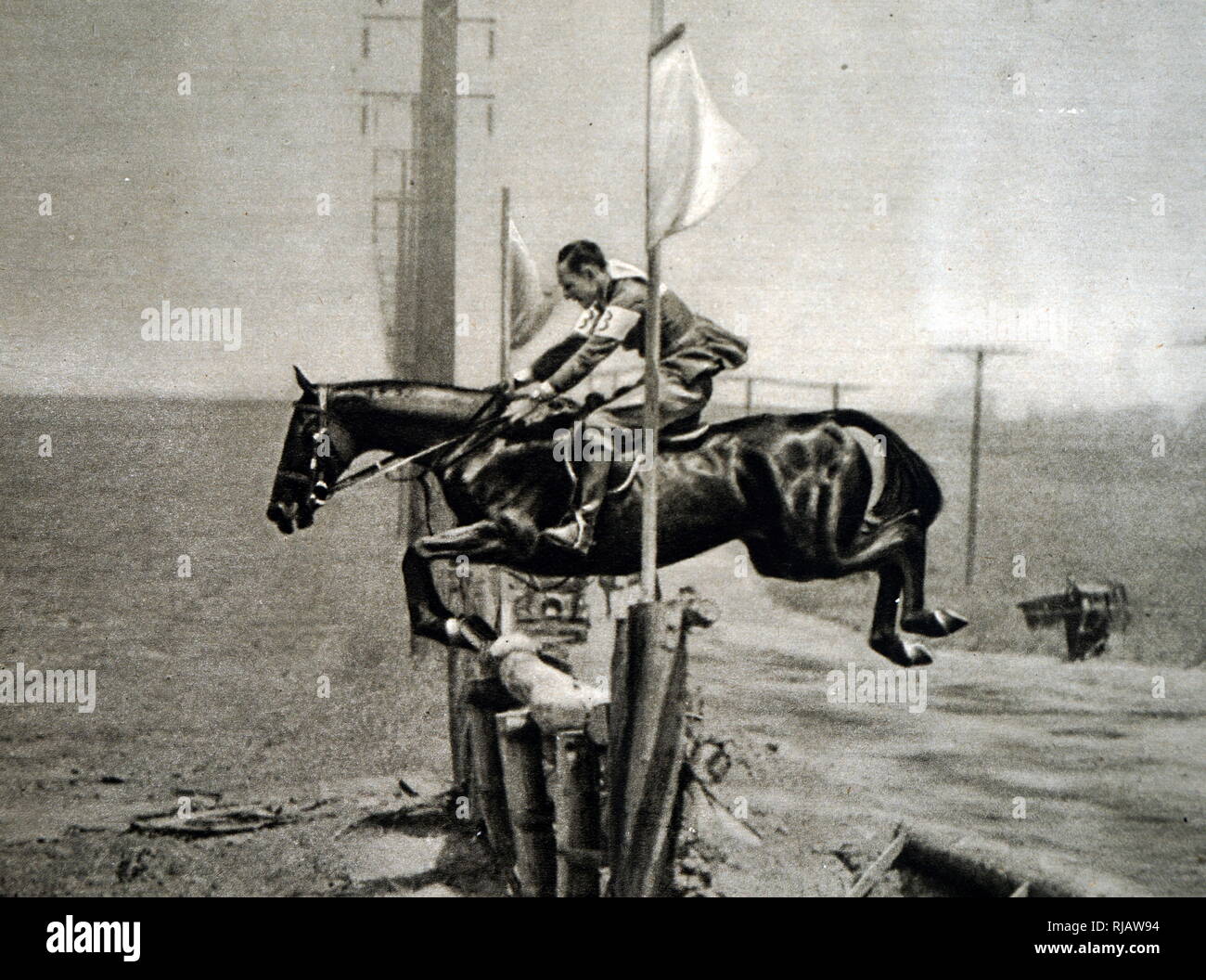 Photograph of Harry Dwight Chamberlin (1887 - 1944) jumping at the 1932 ...