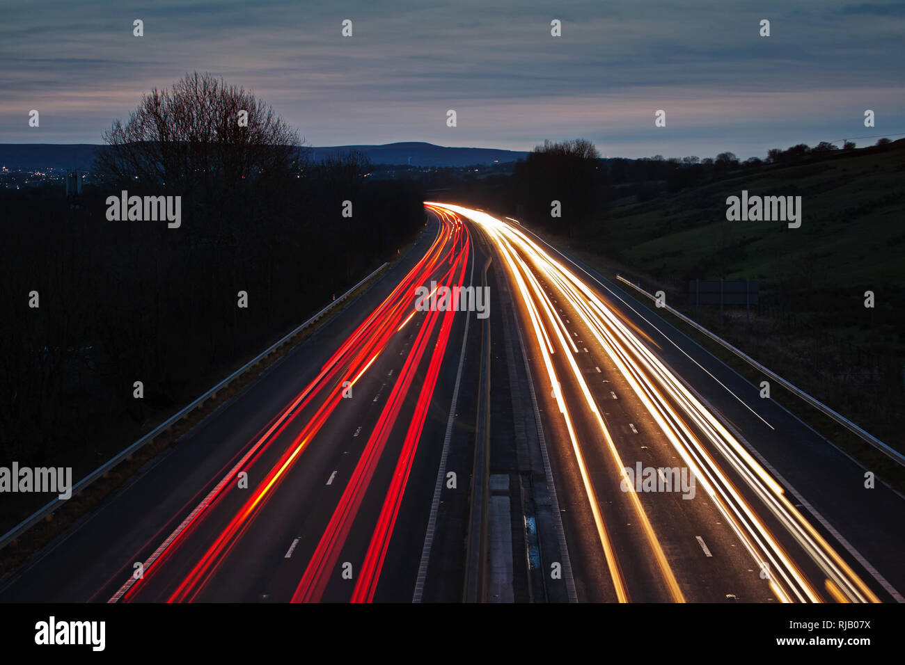 Light trails at dusk Stock Photo - Alamy