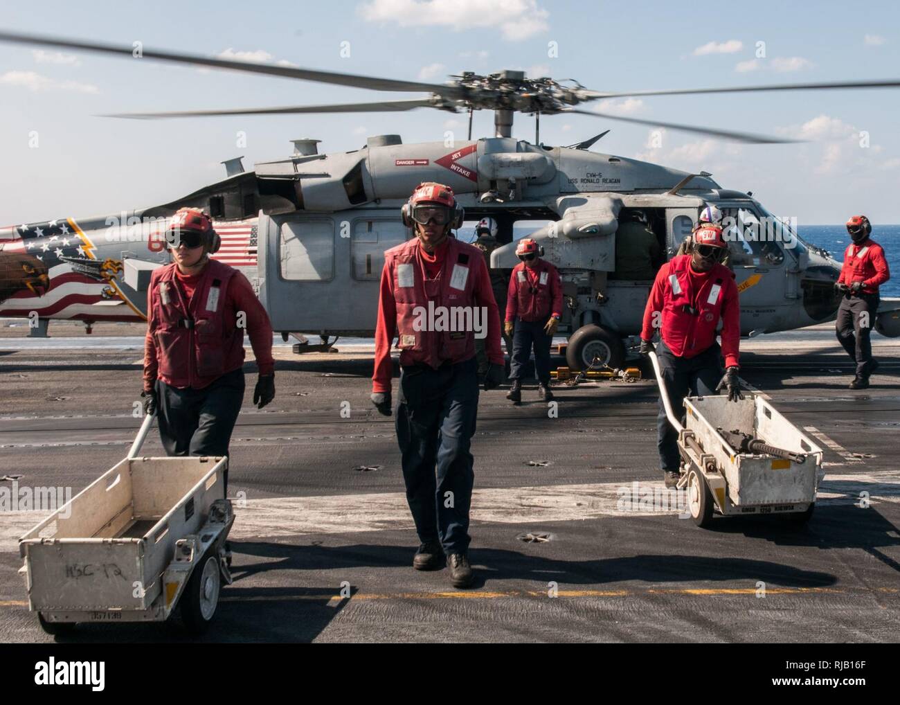 Sailors assigned to the “Golden Falcons” of Helicopter Sea Combat ...