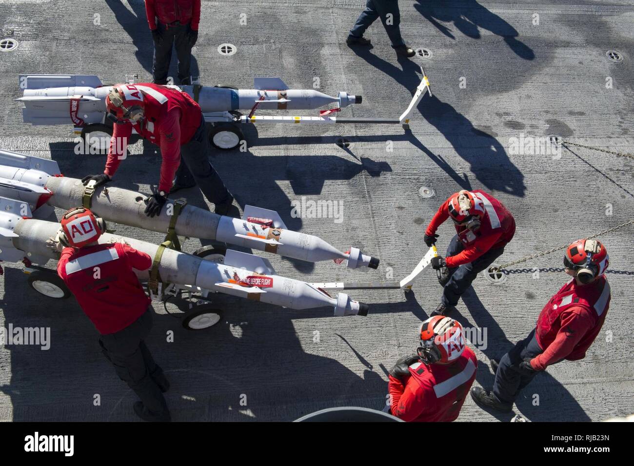 PACIFIC OCEAN (Nov. 4, 2016) Sailors move test ordnance for the F-35B ...