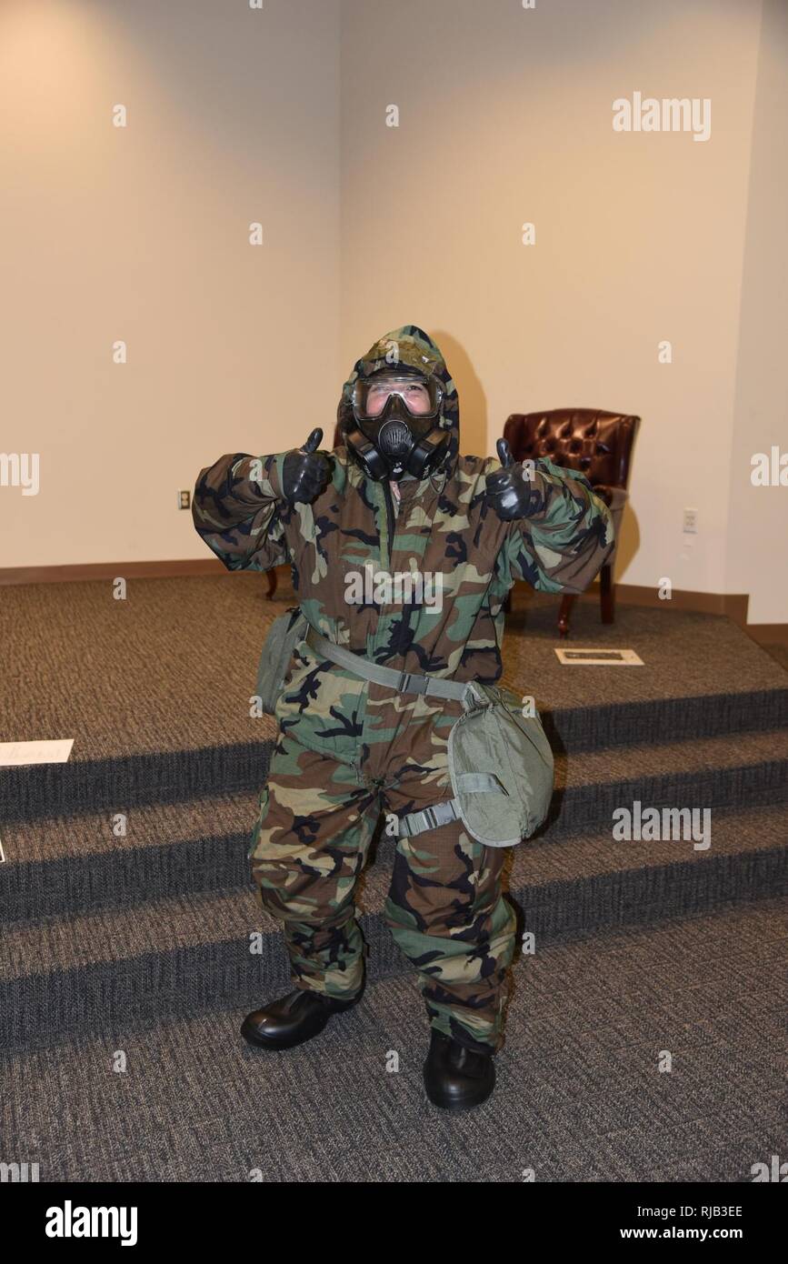 Bethany Butler, from Navy Federal Credit Union, volunteers to put on a ...