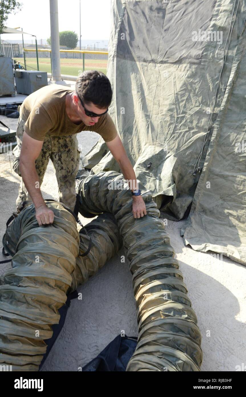 Petty Officer 2nd Class Joshua Dibble, attached to Commander, Task ...