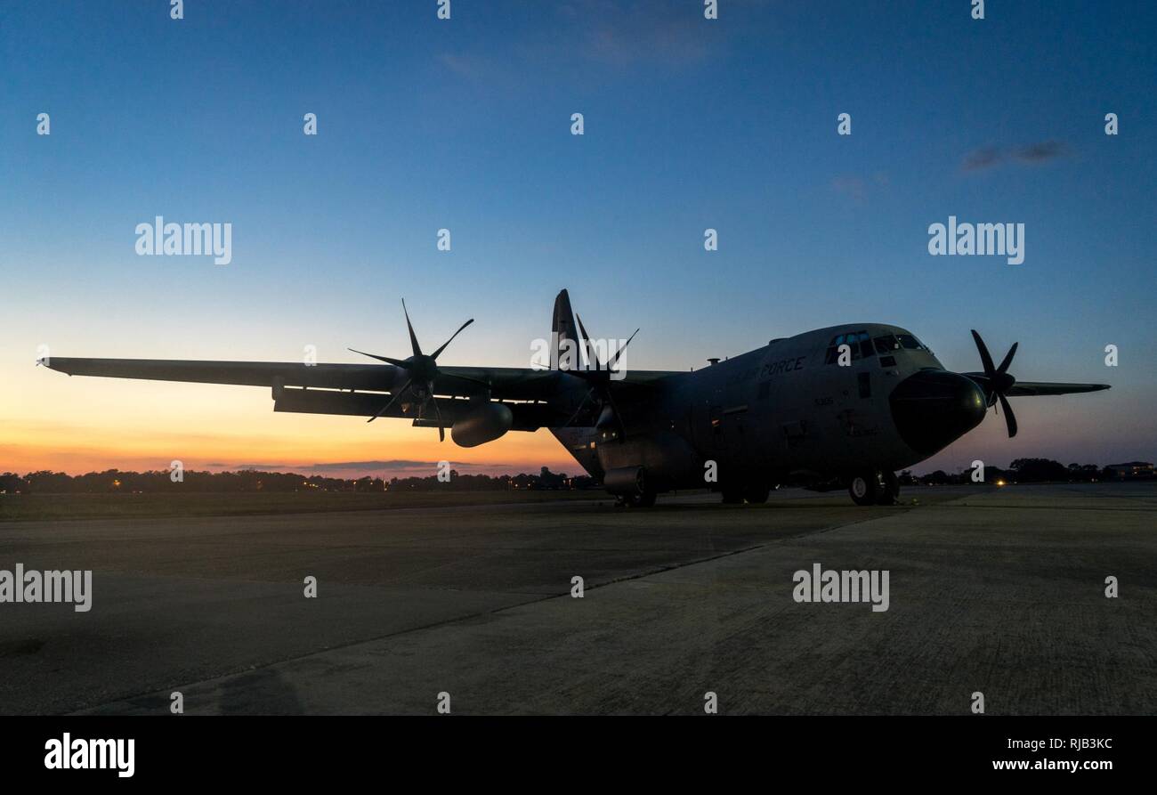The sun sets behind a WC-130J Super Hercules aircraft Nov. 4 at Keesler ...