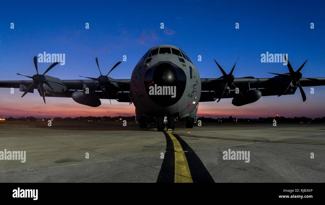 The sun sets behind a WC-130J Super Hercules aircraft Nov. 4 at Keesler ...