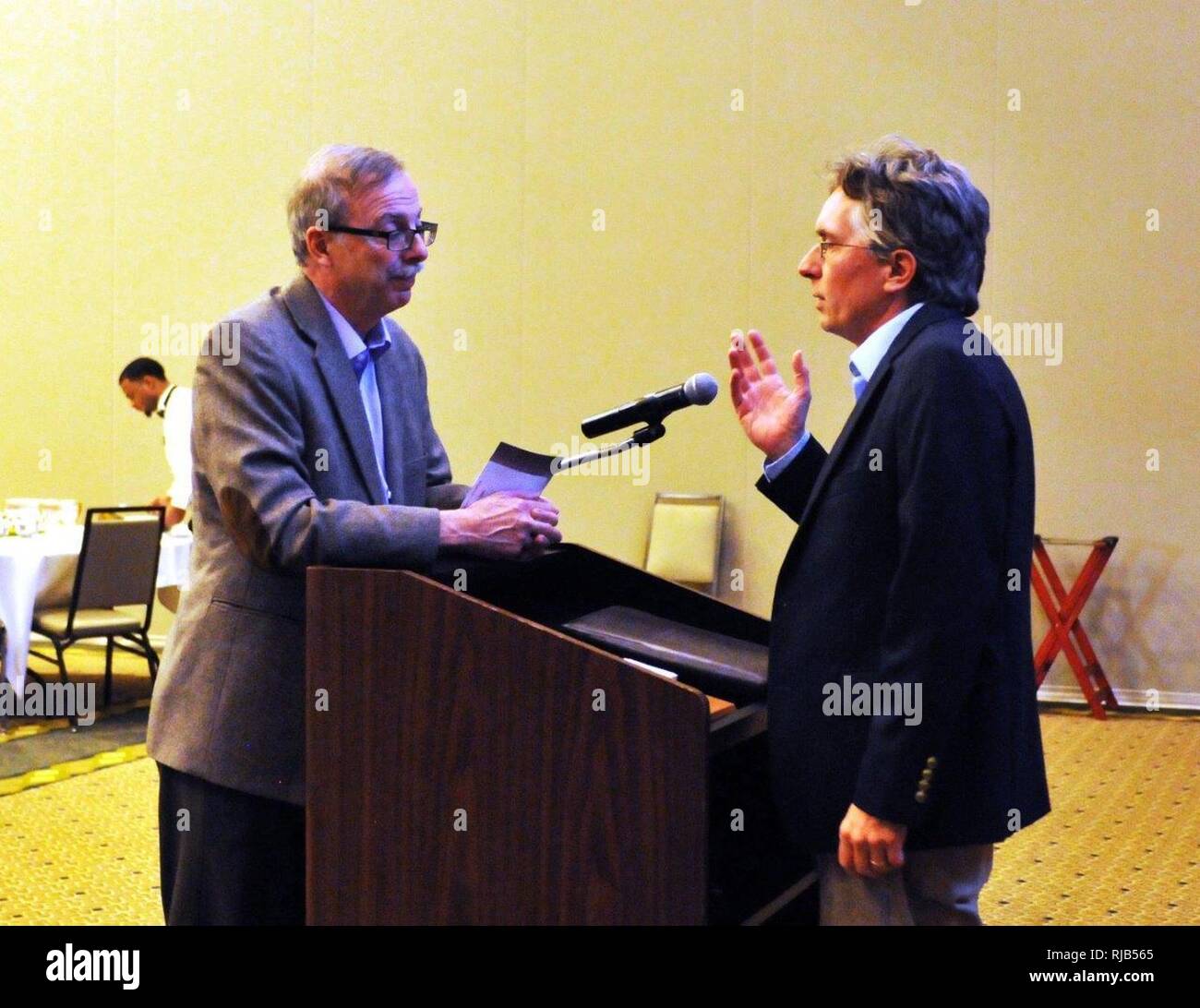 Bob Smith, Fort Riley museum director, talks with guest speaker ...