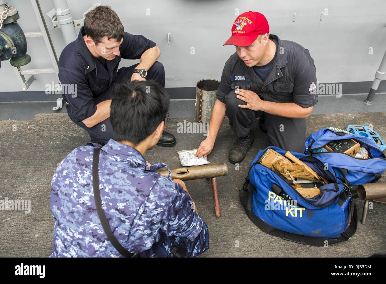 U s navy sailor uss bonhomme richard damage control training hi-res ...