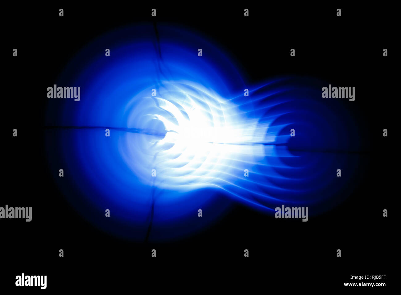 Sound waves in the visible blue color in the dark Stock Photo - Alamy