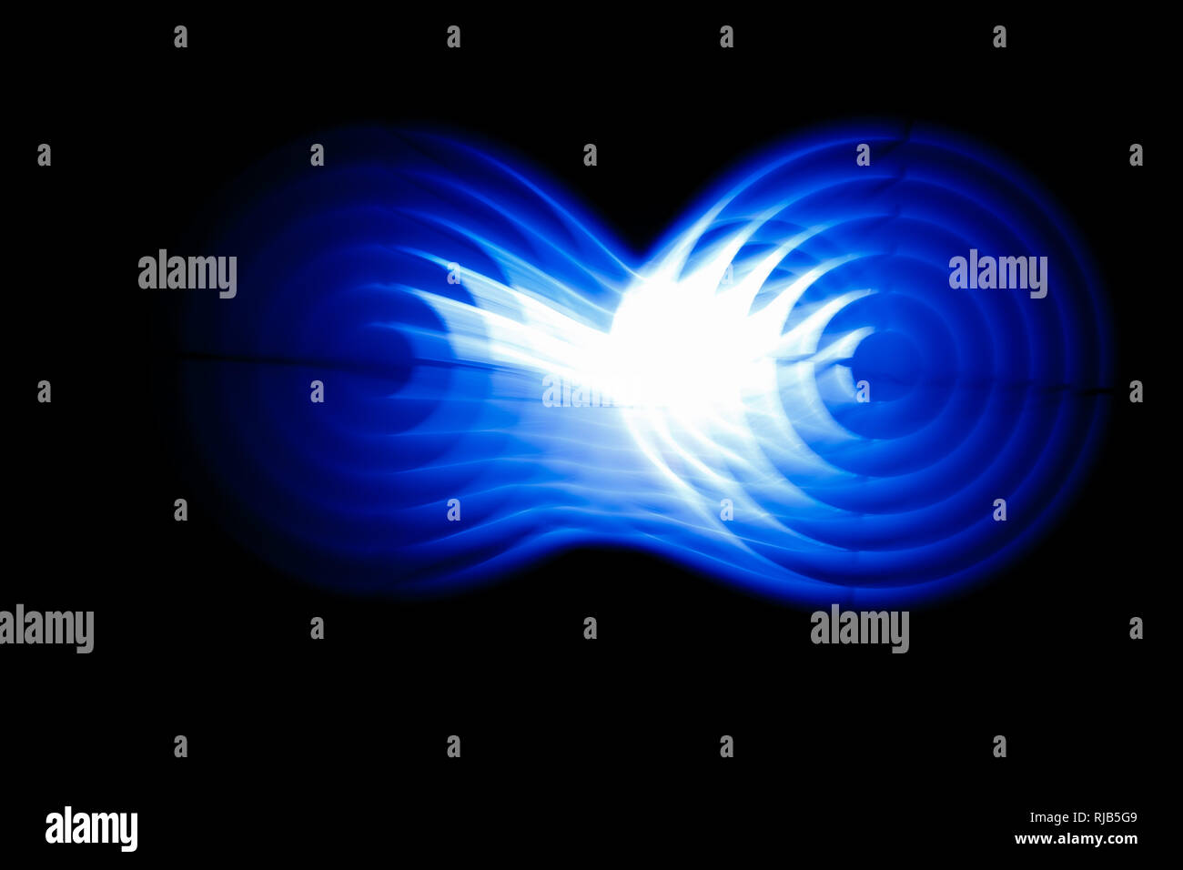 Sound waves in the visible blue color in the dark Stock Photo - Alamy