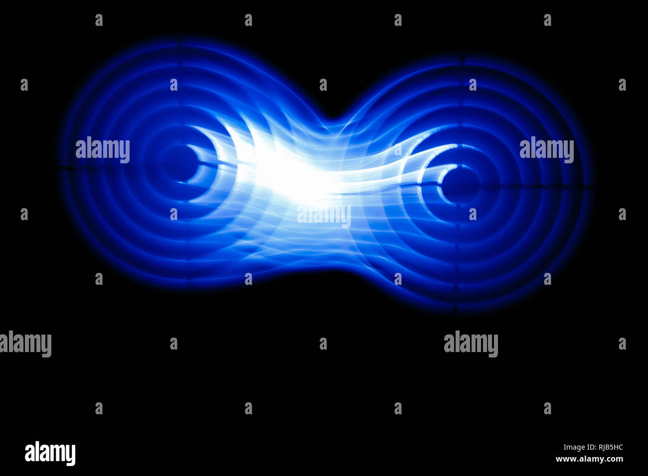 Sound waves in the visible blue color in the dark Stock Photo - Alamy