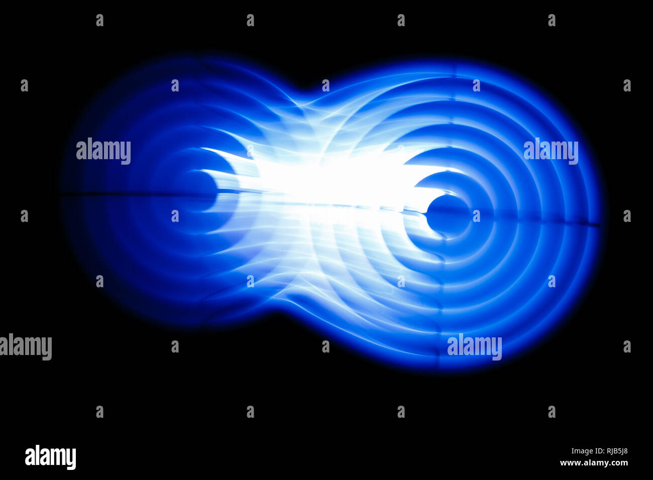 Sound waves in the visible blue color in the dark Stock Photo - Alamy