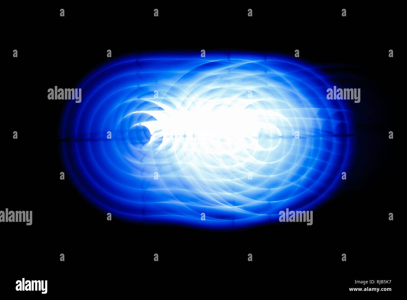 Sound waves in the visible blue color in the dark Stock Photo - Alamy