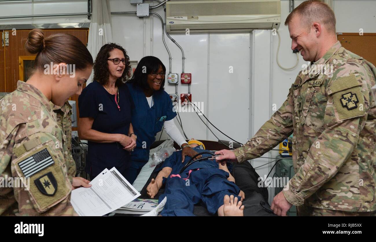 U.S. Army Capt. Krista Wellein, left, trauma nurse, 28th Combat Support ...
