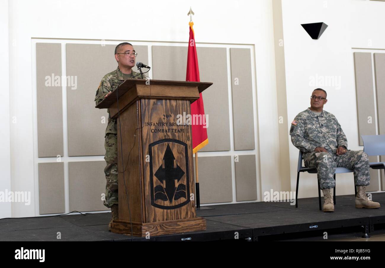 Brig. Gen. Keith Y. Tamashiro addresses the audience near the end of a ...