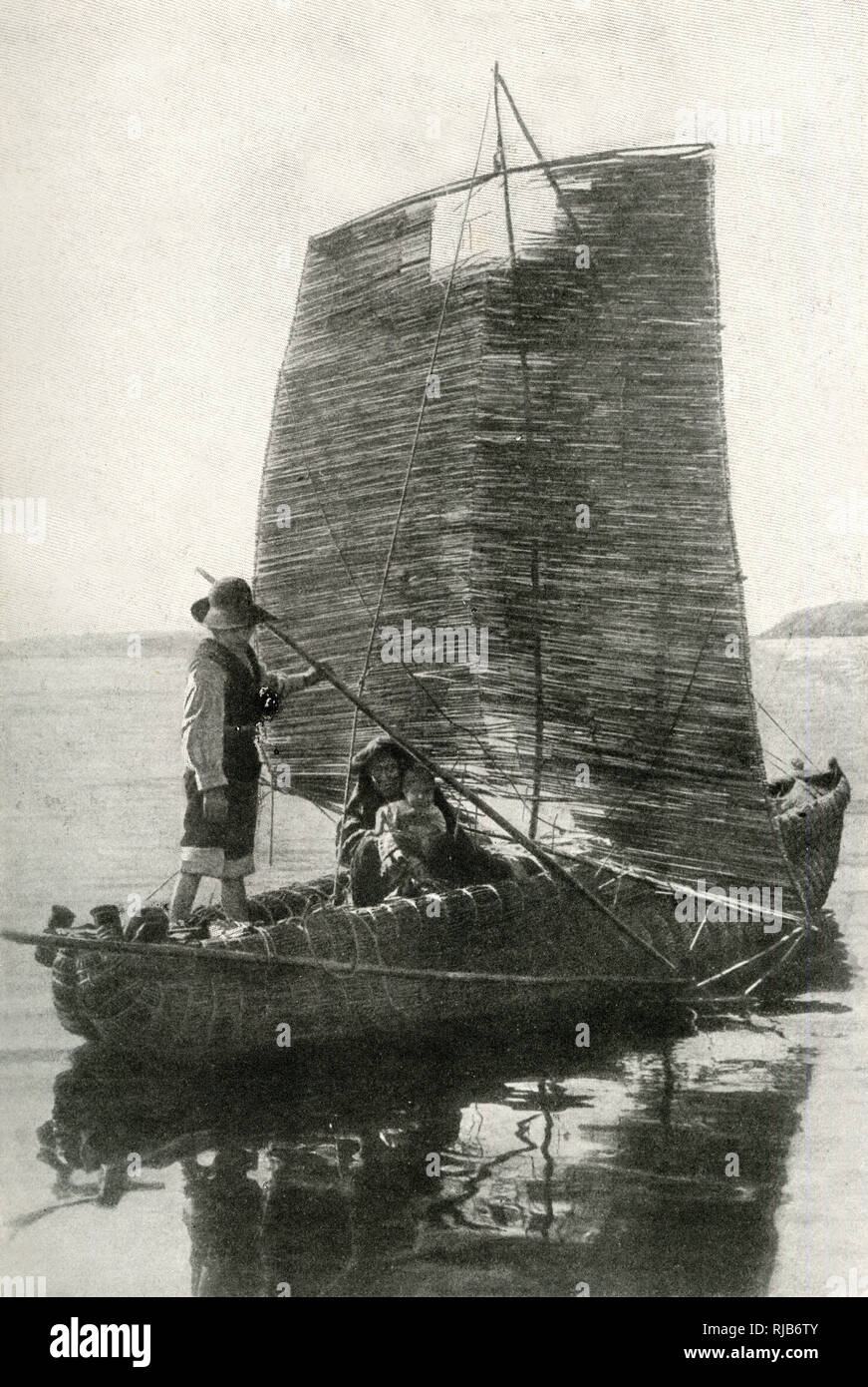 Indigenous family in boat, Bolivia, South America Stock Photo - Alamy