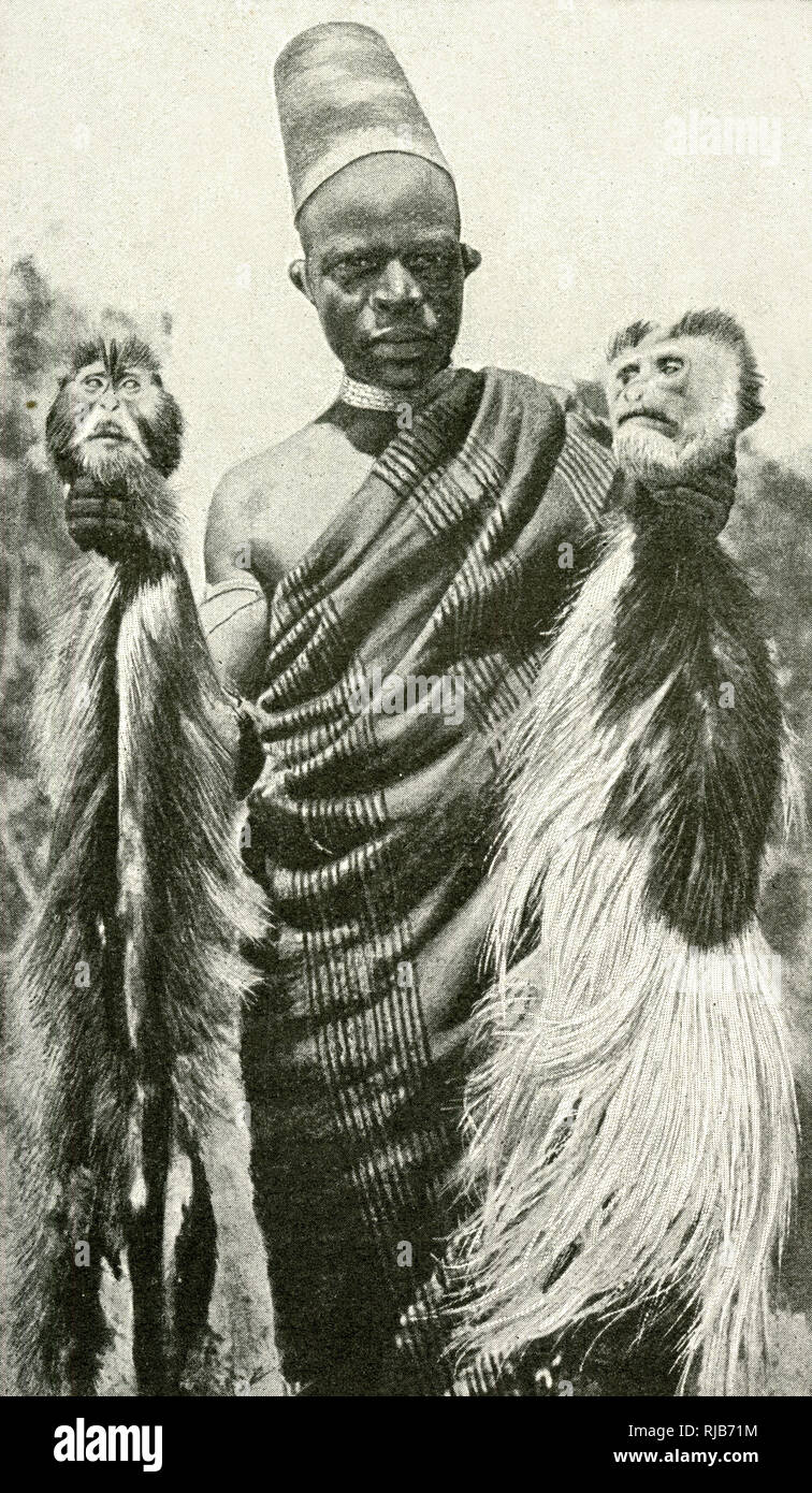 Man with two monkey heads, East Africa Stock Photo - Alamy