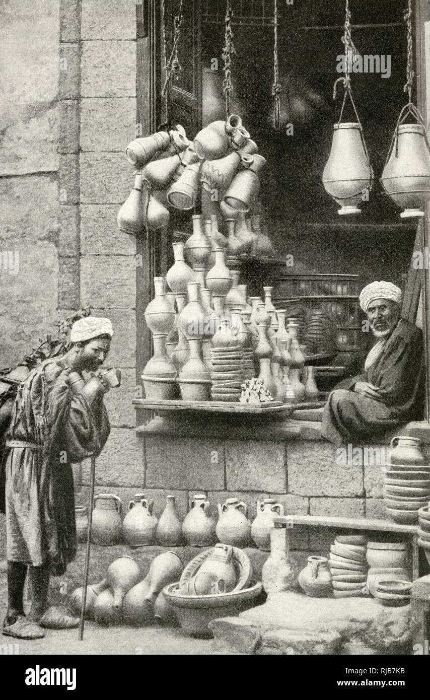 Arab pottery shop and shopkeeper, Cairo, Egypt Stock Photo - Alamy