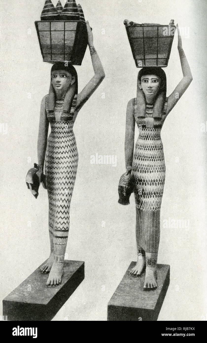 Wooden statues of handmaidens, Thebes, Egypt Stock Photo - Alamy