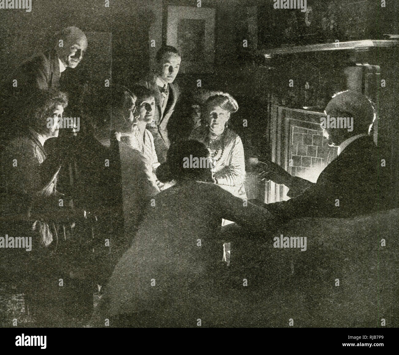 Sitting around fire uk hi-res stock photography and images - Alamy