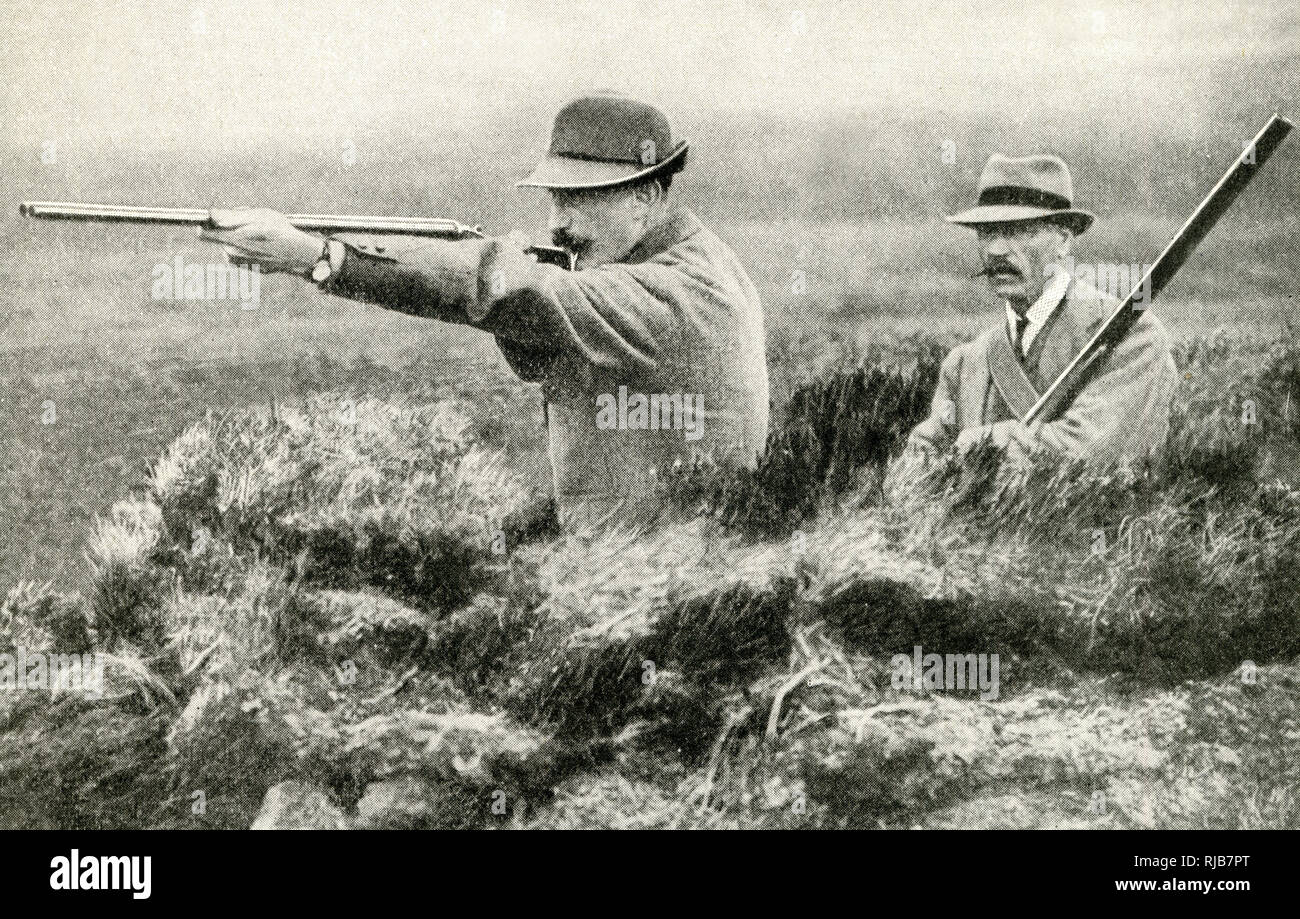 Two men shooting grouse from butts on an English moor -- the hunting ...