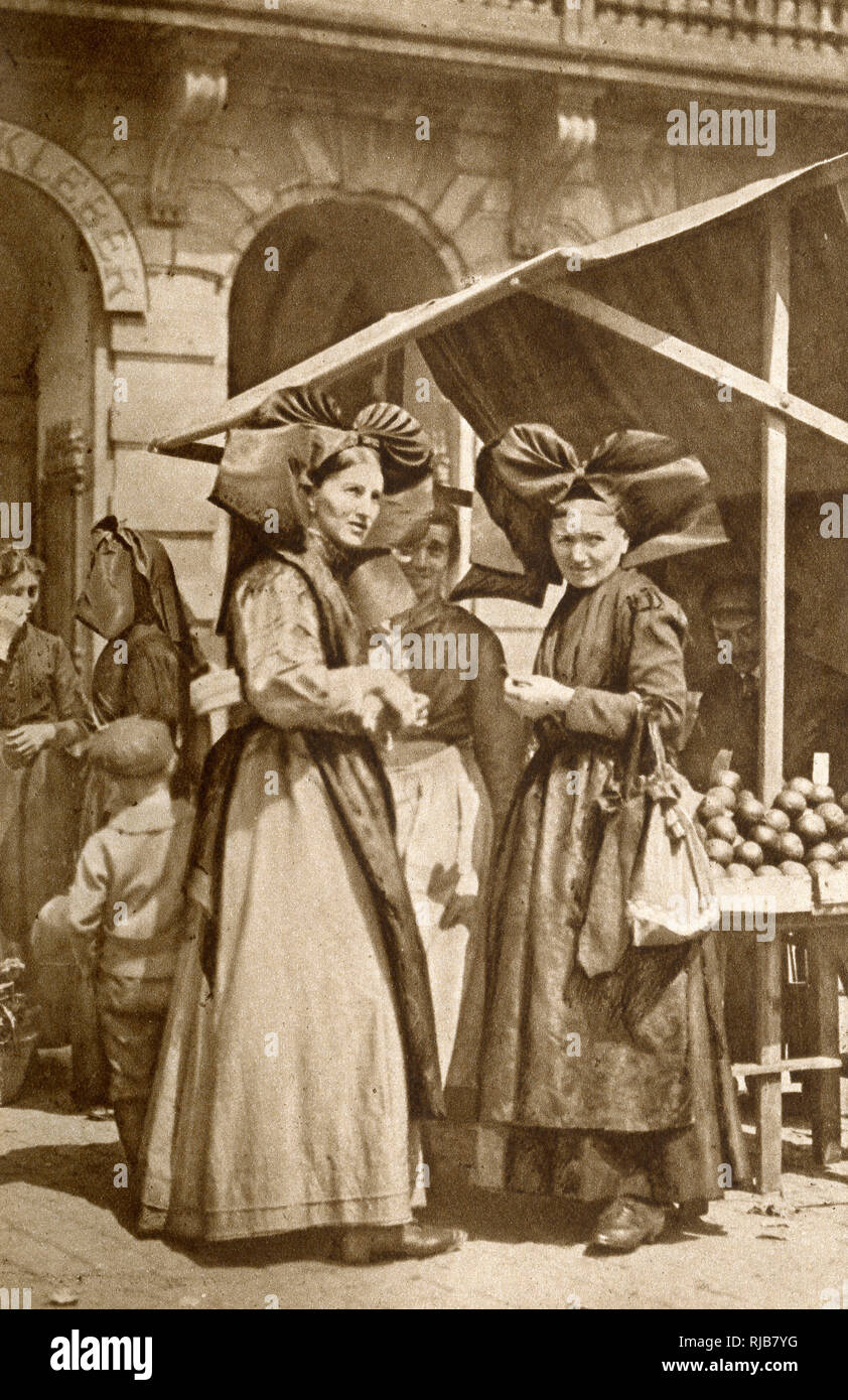 Women out shopping in traditional costume, Alsace, France Stock Photo ...