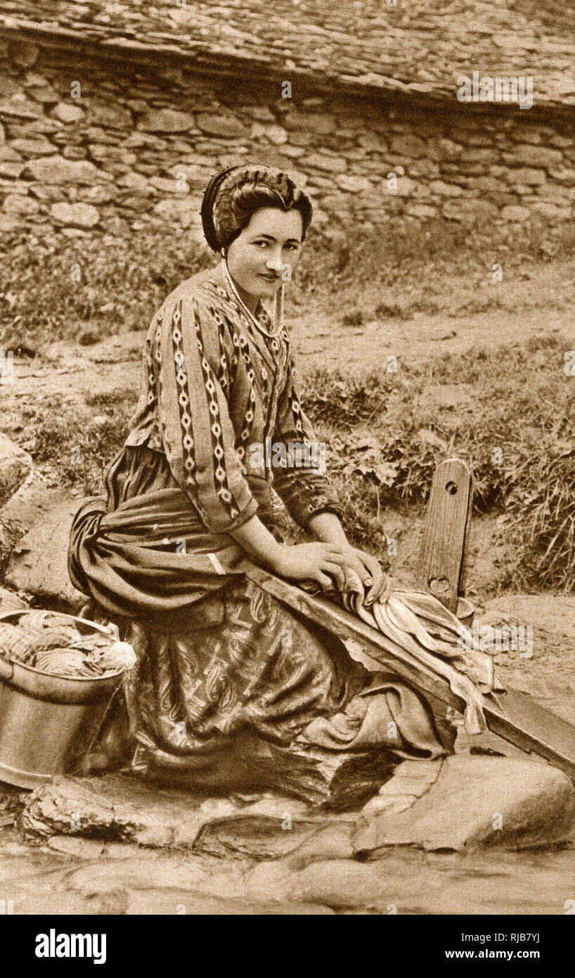 Woman and washboard and clothes hi-res stock photography and images - Alamy