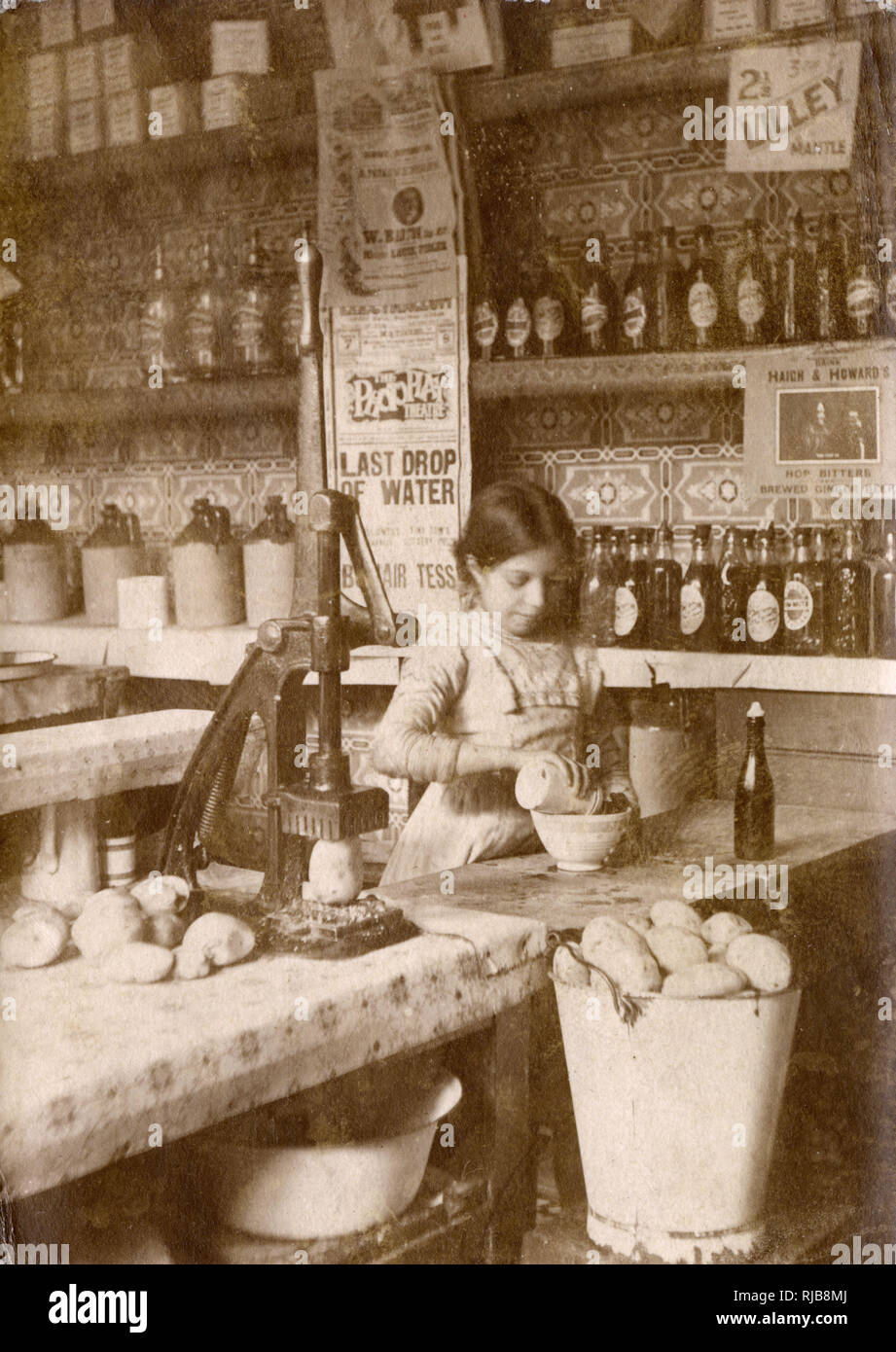 Young girl preparing chips - Fish & Chip Shop, Morecambe Stock Photo ...