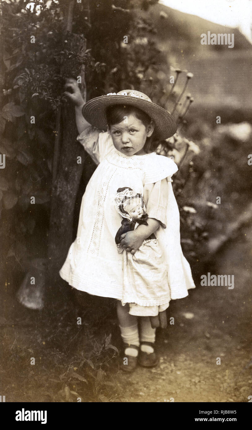 Edwardian child with doll Stock Photo - Alamy