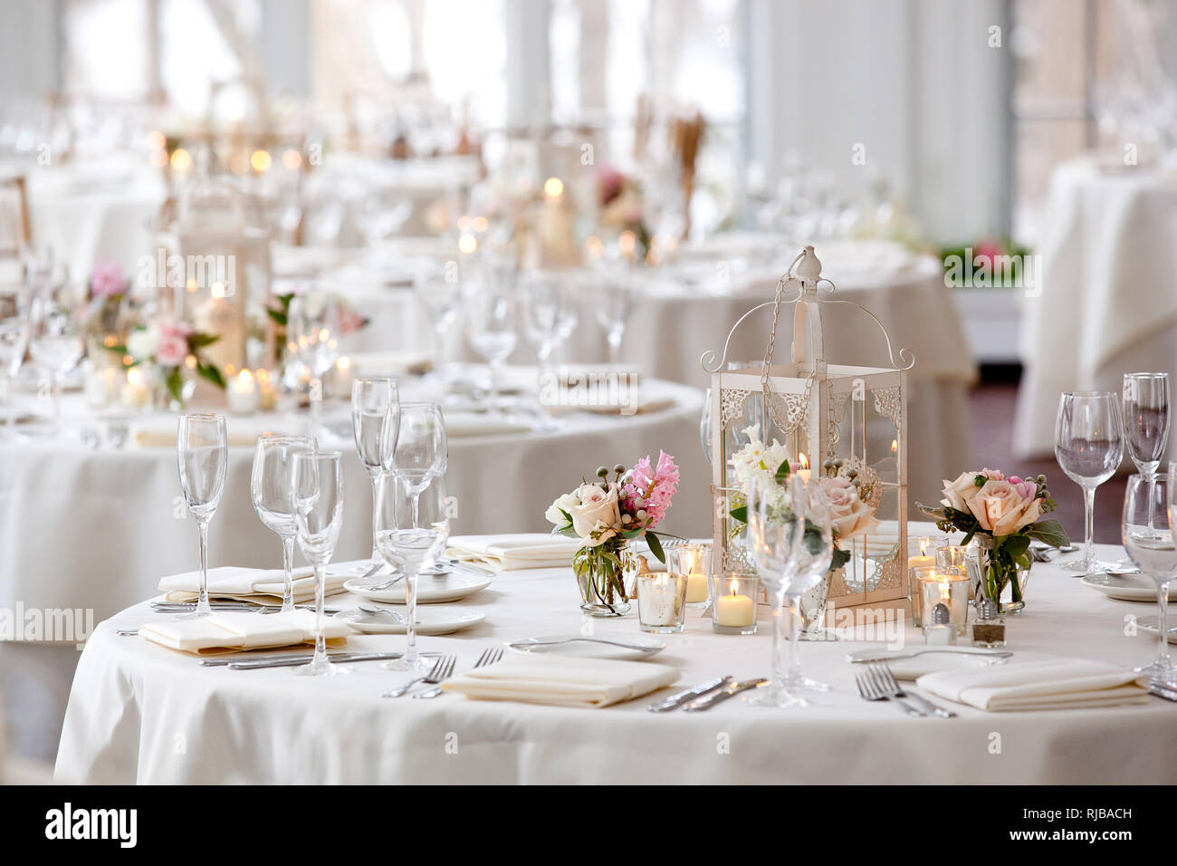 interior photo of wedding tables set for fine dinning during a wedding ...