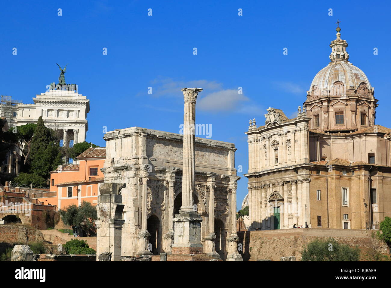 Ancient Roman ruins and distant church dome. Italy. A view from the Old ...