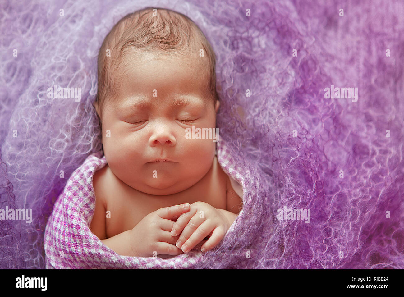 Newborn baby tender sleeping on wool couturier blanket. Pure human ...