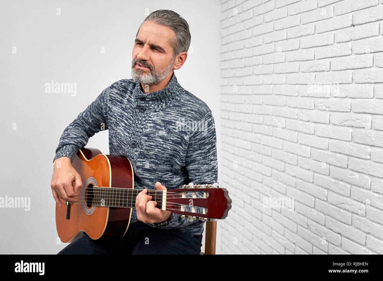 Guitar acoustic wall man musician instrument hi-res stock photography ...