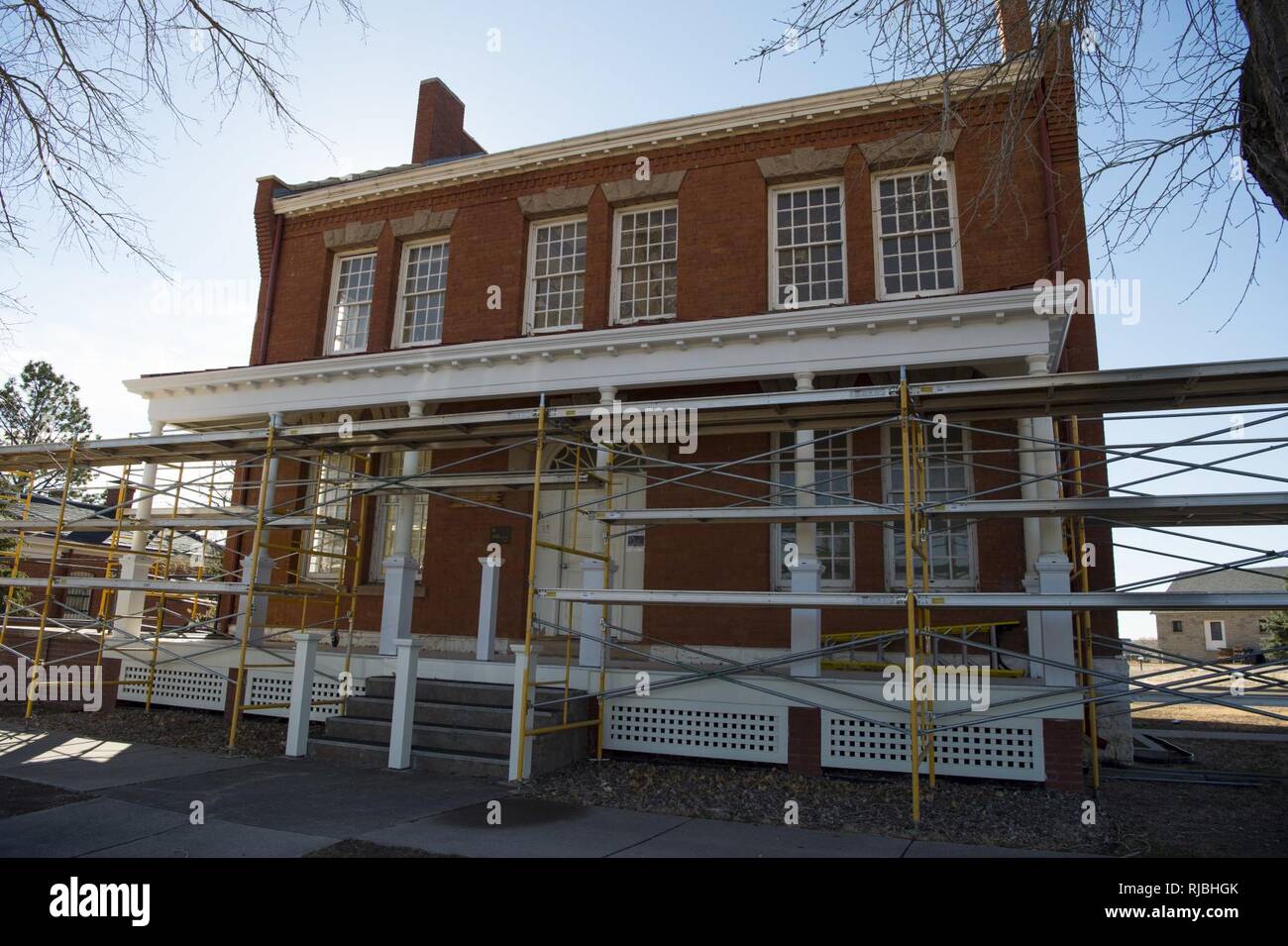 Scaffolding surrounds the outside of Building 210 at F.E. Warren Air ...