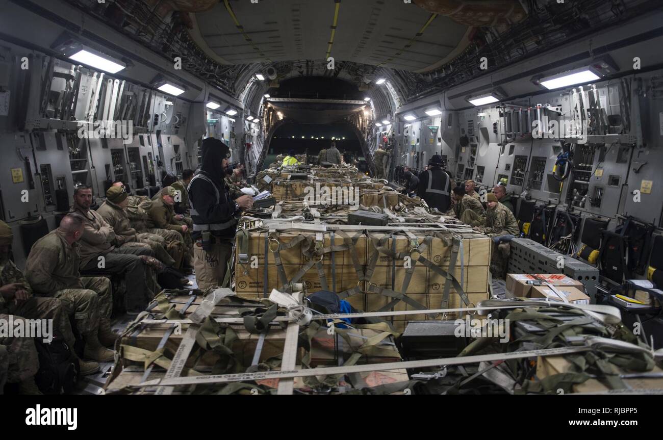 U.S. Air Force C-17 Globemaster III loadmasters, assigned to the 816th Expeditionary Airlift ...