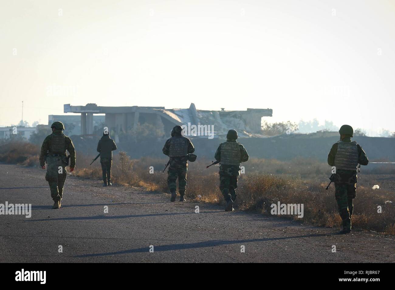 Iraqi Soldiers attached to the 57th Brigade conduct a patrol during ...